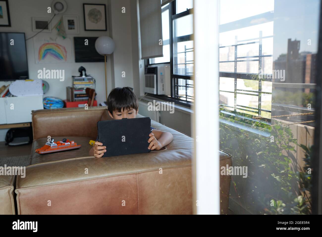 tween on tablet Stock Photo - Alamy