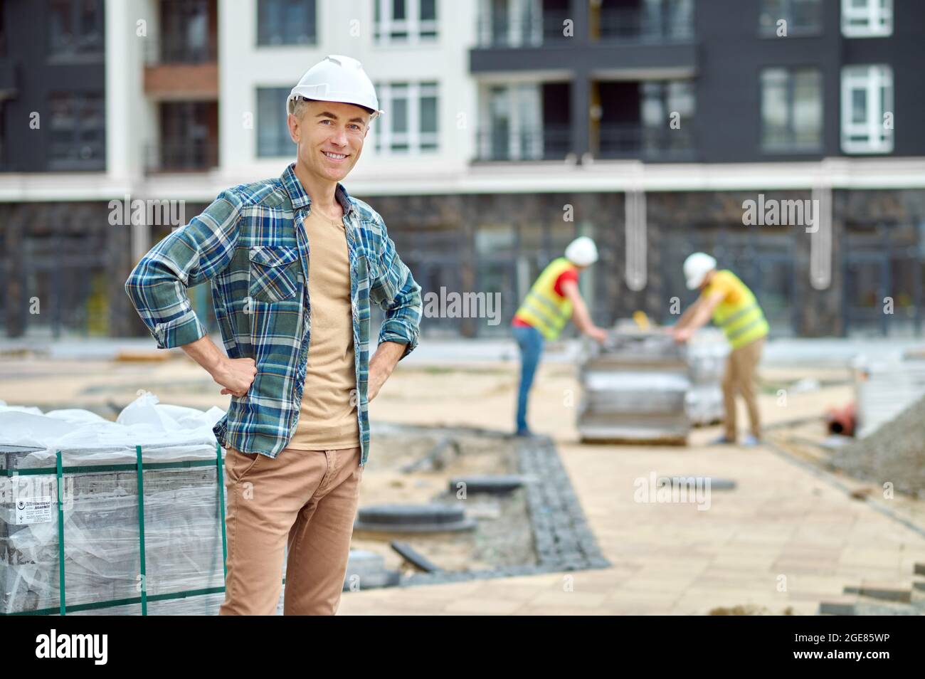 Cheerful man engineer standing hi-res stock photography and images - Alamy
