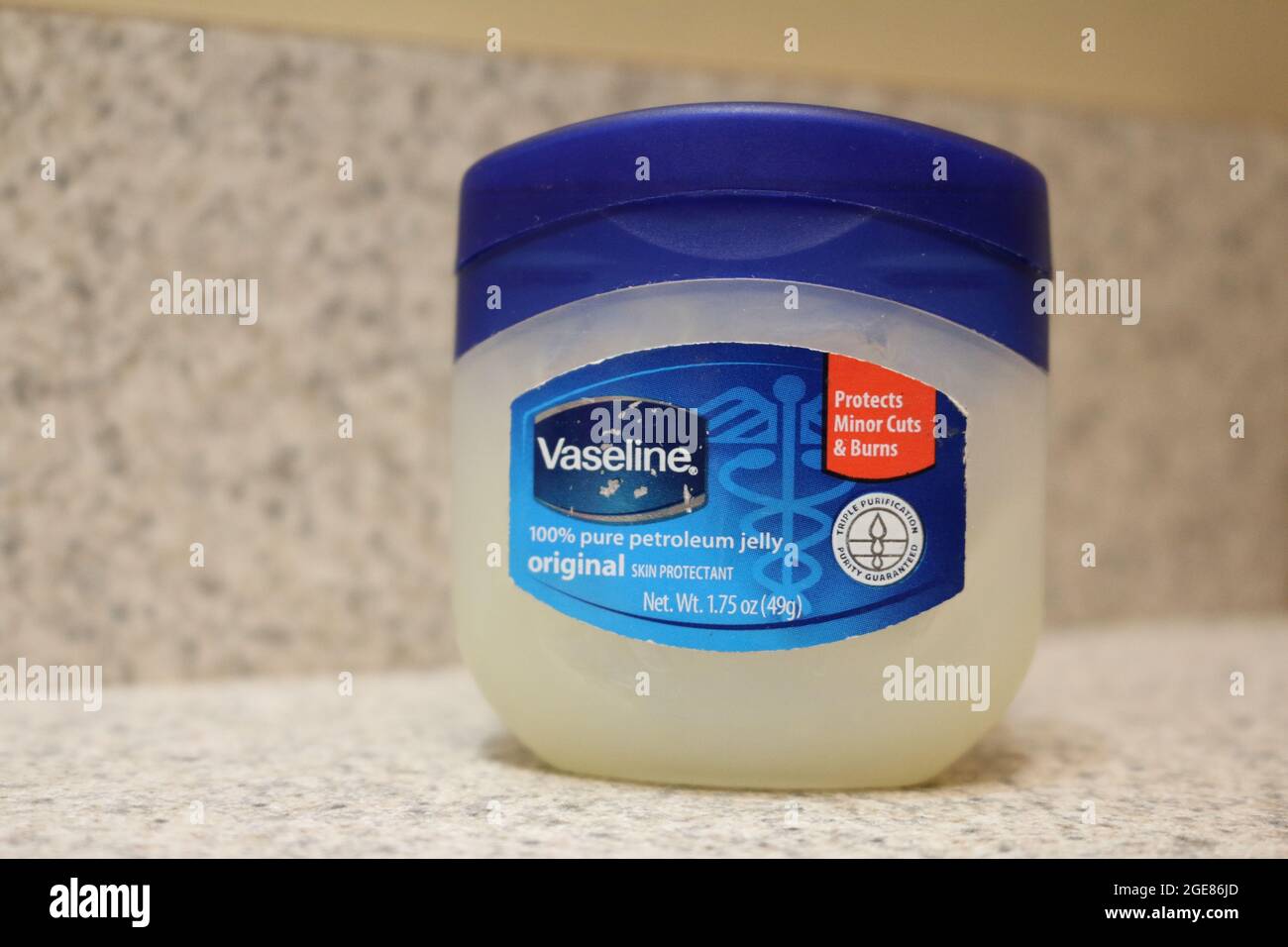 Vaseline tub on bathroom counter Stock Photo - Alamy