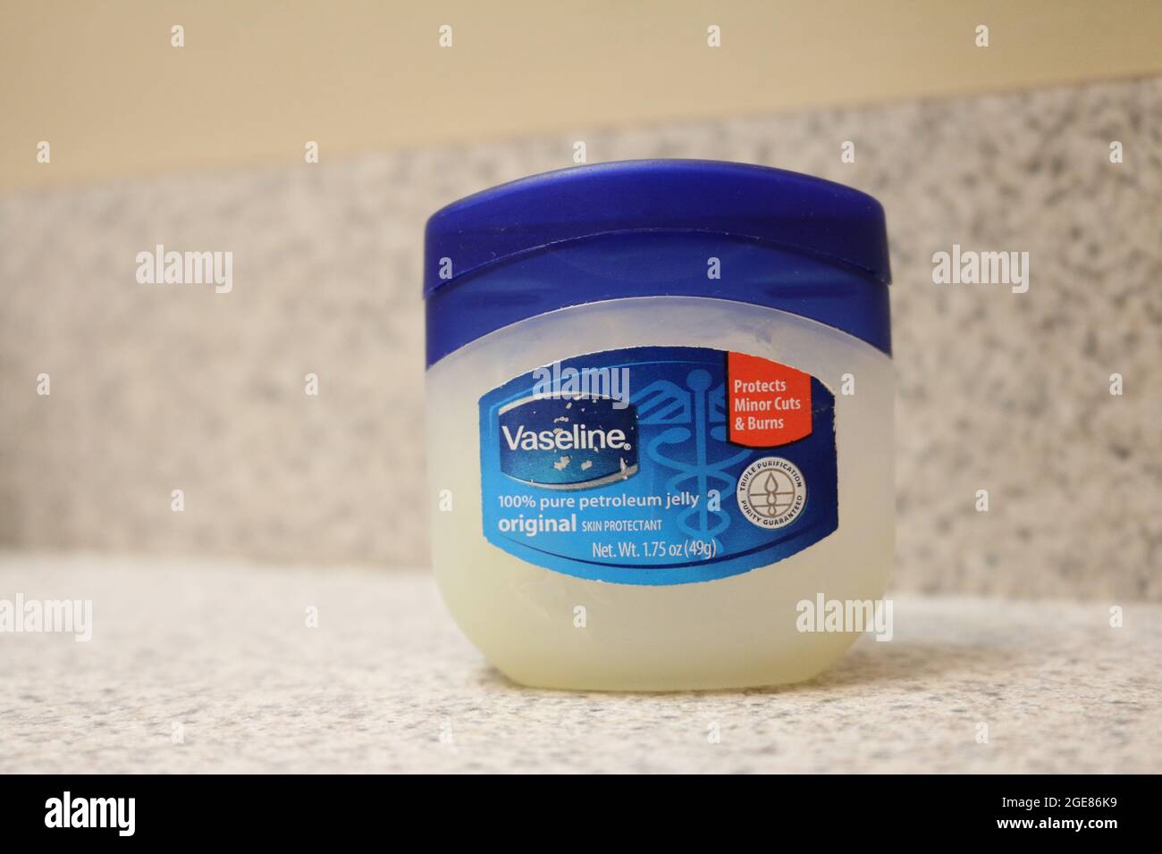 Vaseline tub on bathroom counter Stock Photo - Alamy