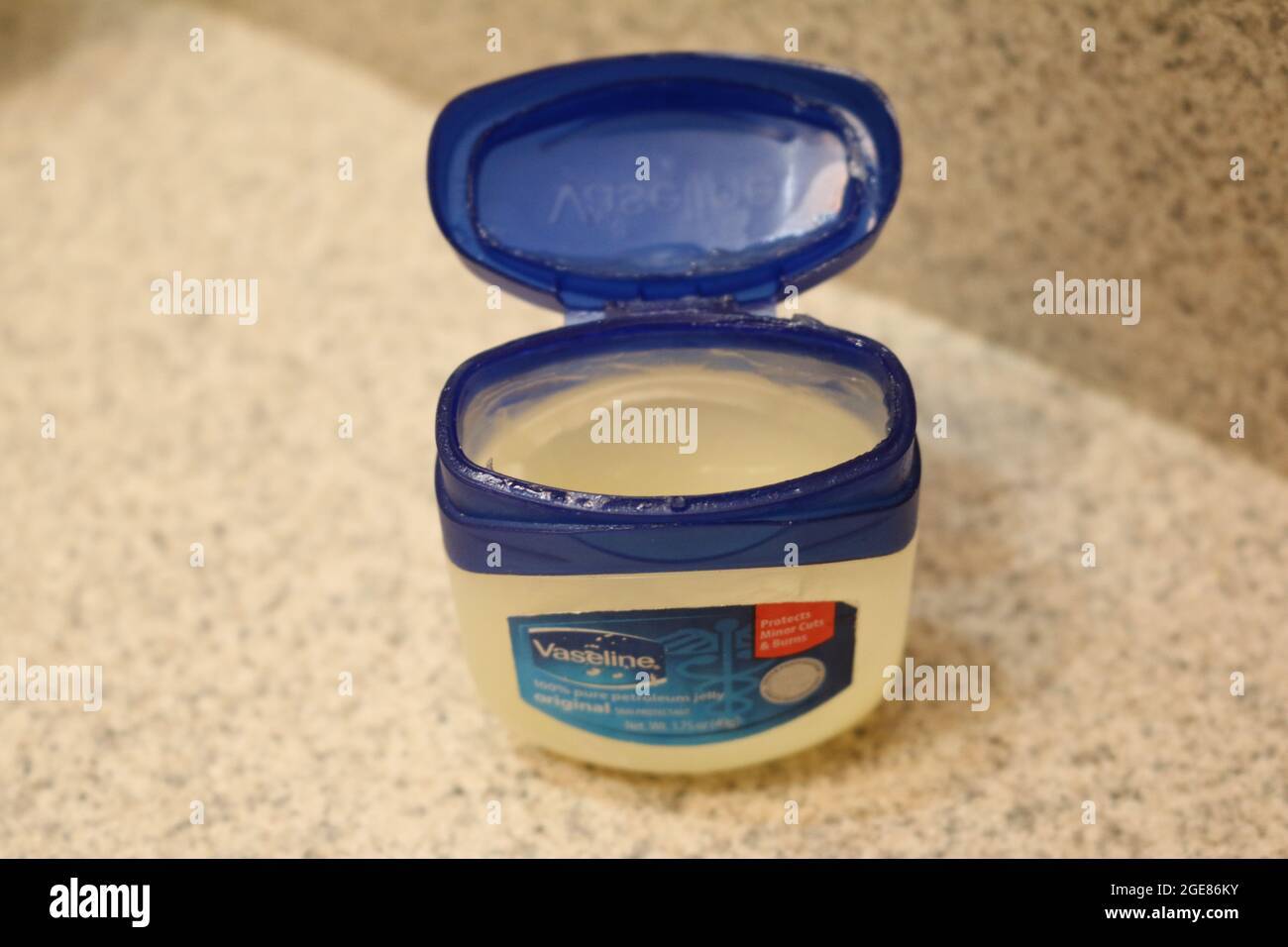 Vaseline tub with an open lid Stock Photo - Alamy