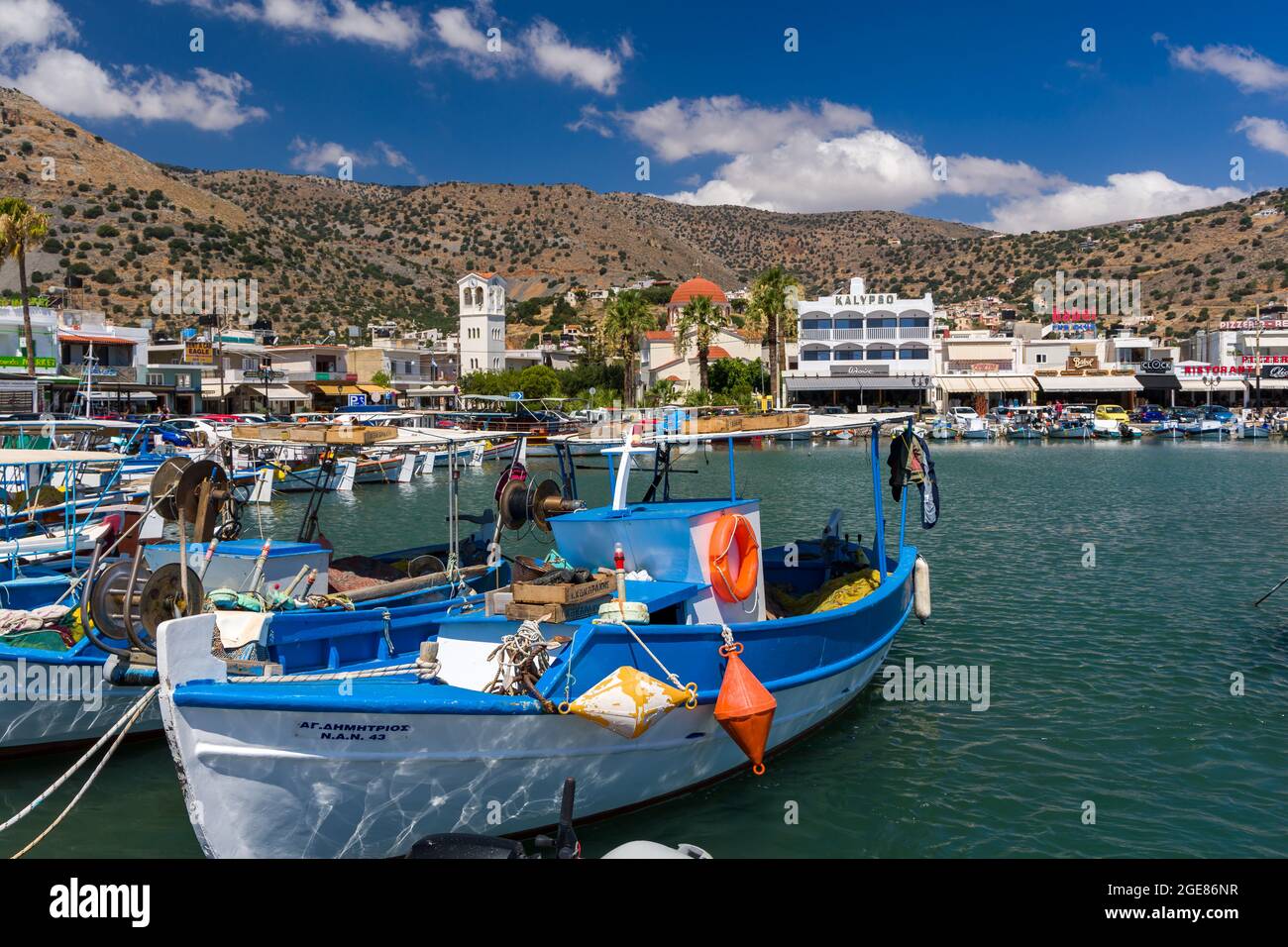 ELOUNDA, CRETE - 11 JULY 2021: Colorful traditional fishing boats and ...