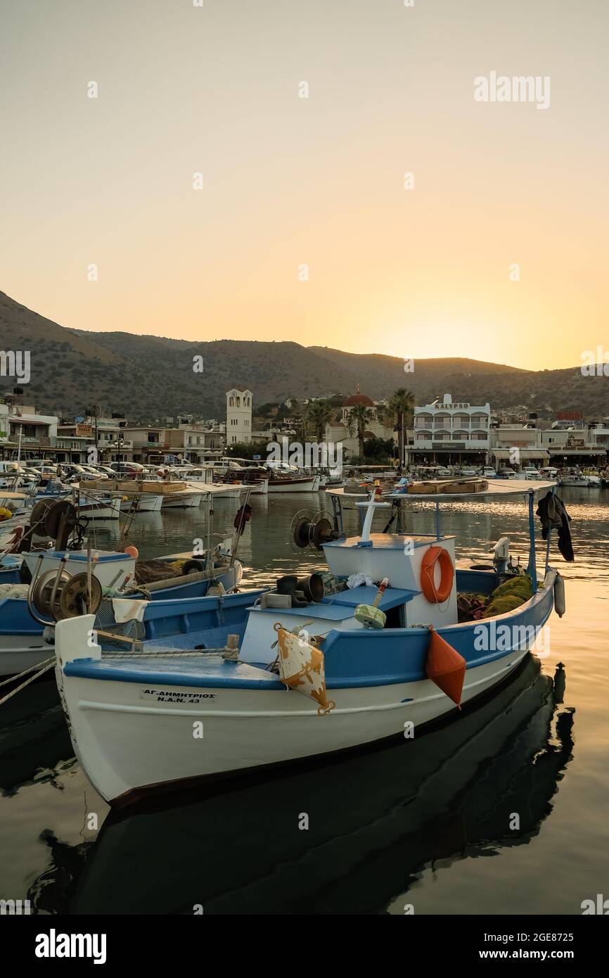 ELOUNDA, CRETE - 11 JULY 2021: Colorful traditional fishing boats and ...