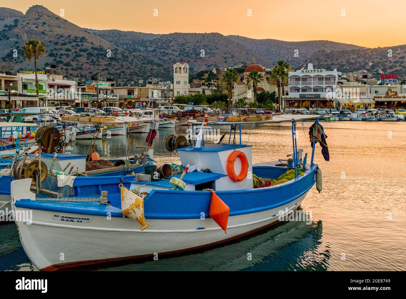 ELOUNDA, CRETE - 11 JULY 2021: Colorful traditional fishing boats and ...