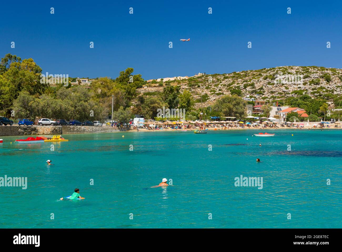 MARATHI, CRETE - 18 JULY 2021: Locals and tourists relaxing on the ...