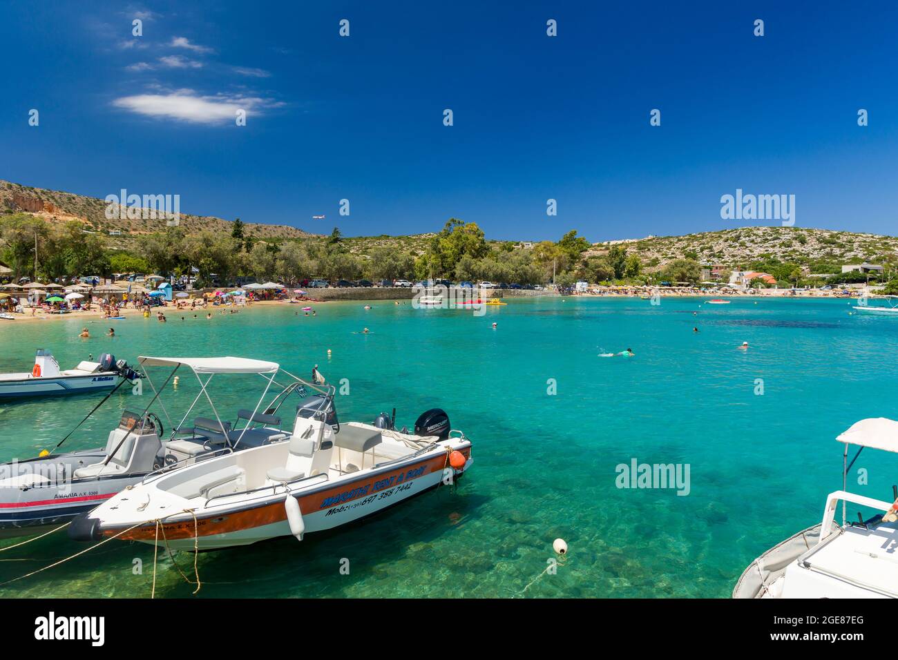 MARATHI, CRETE - 18 JULY 2021: Locals and tourists relaxing on the ...