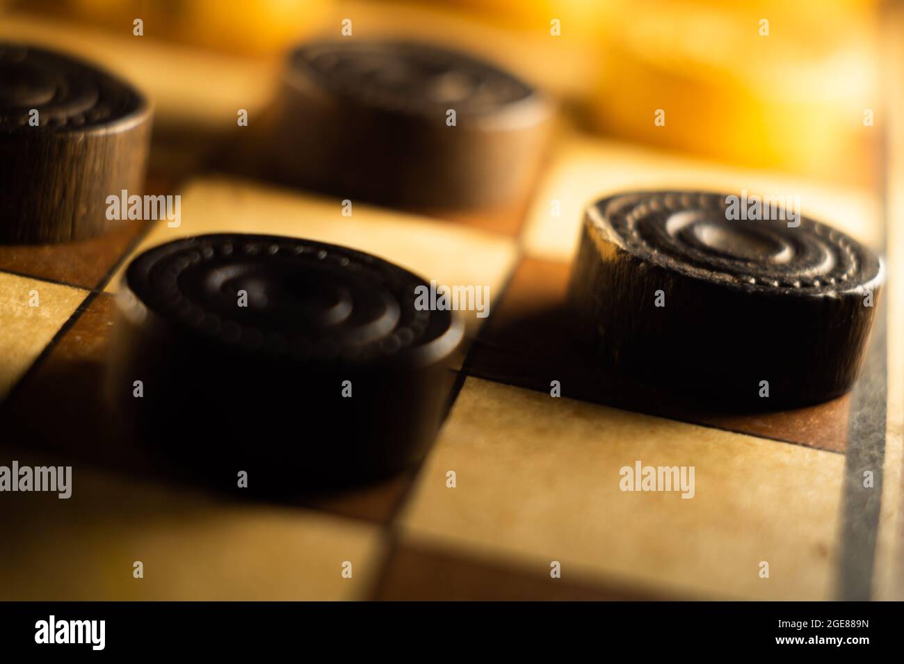 Closeup shot of checkers pieces on the board Stock Photo - Alamy