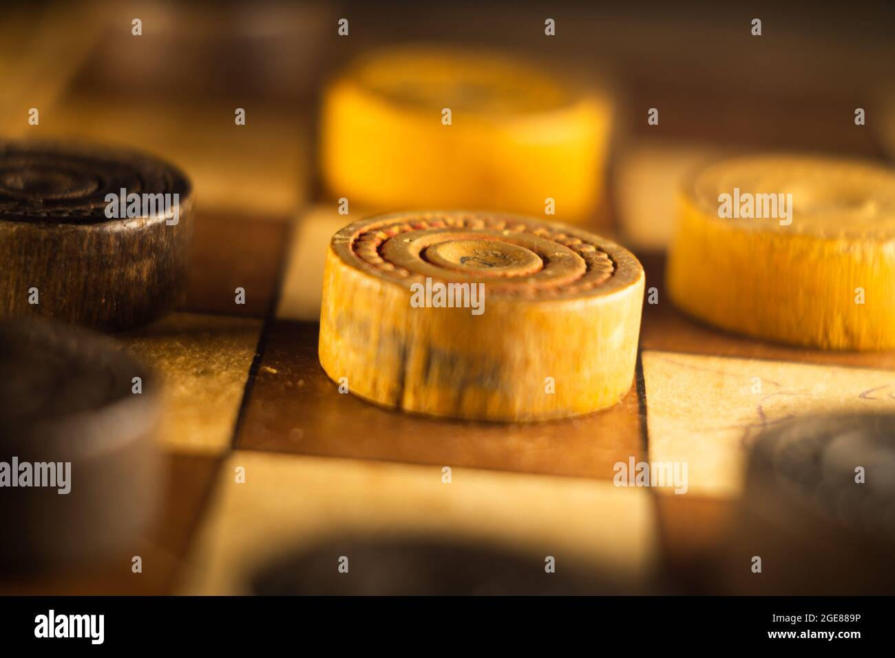 High angle shot of a checkers board with black and white pieces Stock ...