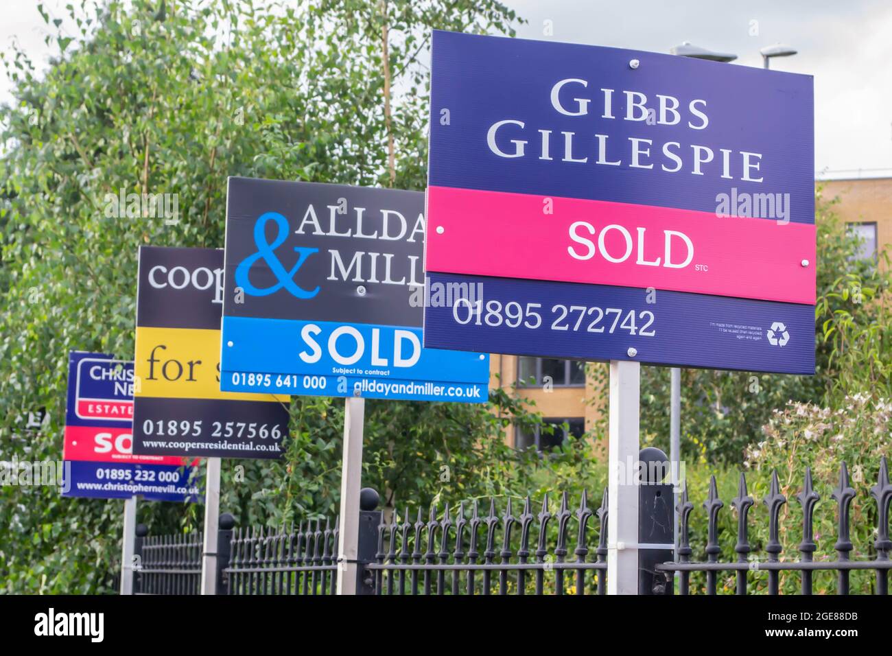 HILLINGDON, LONDON, ENGLAND - 14 August 2021: Sold signs outside block ...