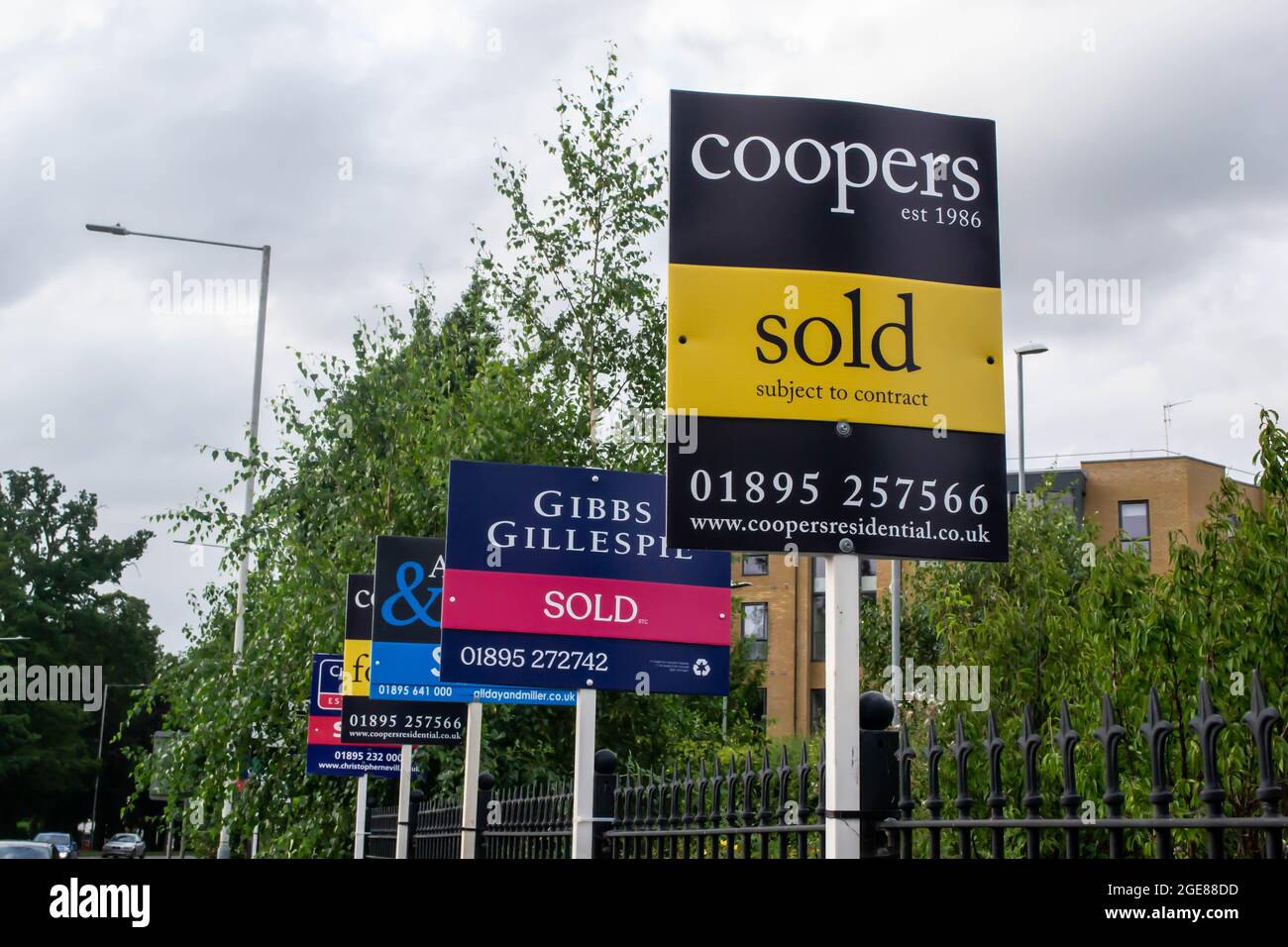 HILLINGDON, LONDON, ENGLAND - 14 August 2021: Sold signs outside block ...