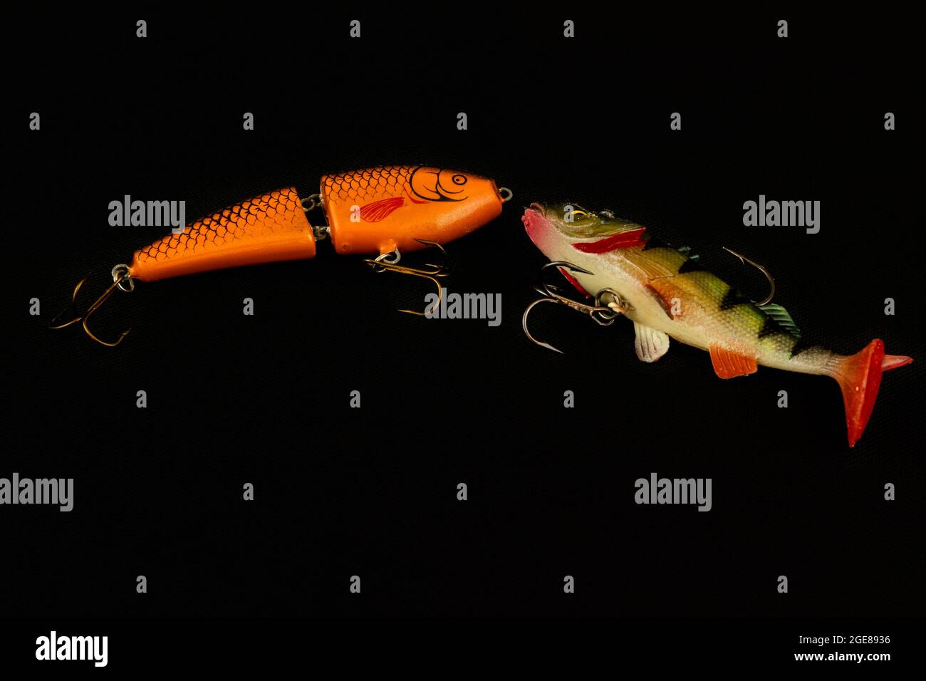 Fish shape wobblers isolated on a black background Stock Photo - Alamy
