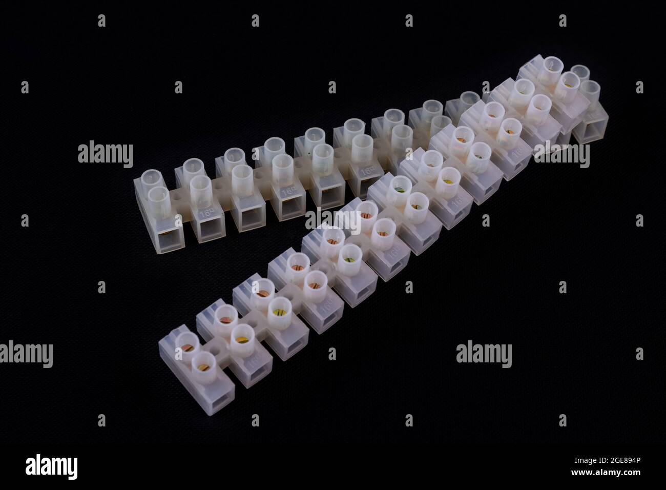 Transparent terminal blocks isolated on a black background Stock Photo ...
