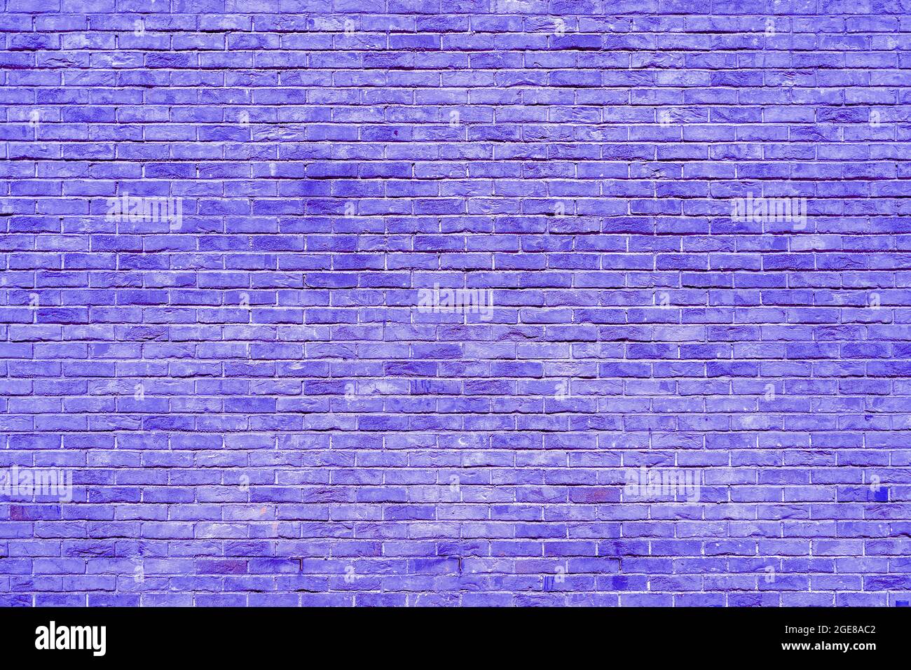 Violet brick wall texture background Stock Photo - Alamy