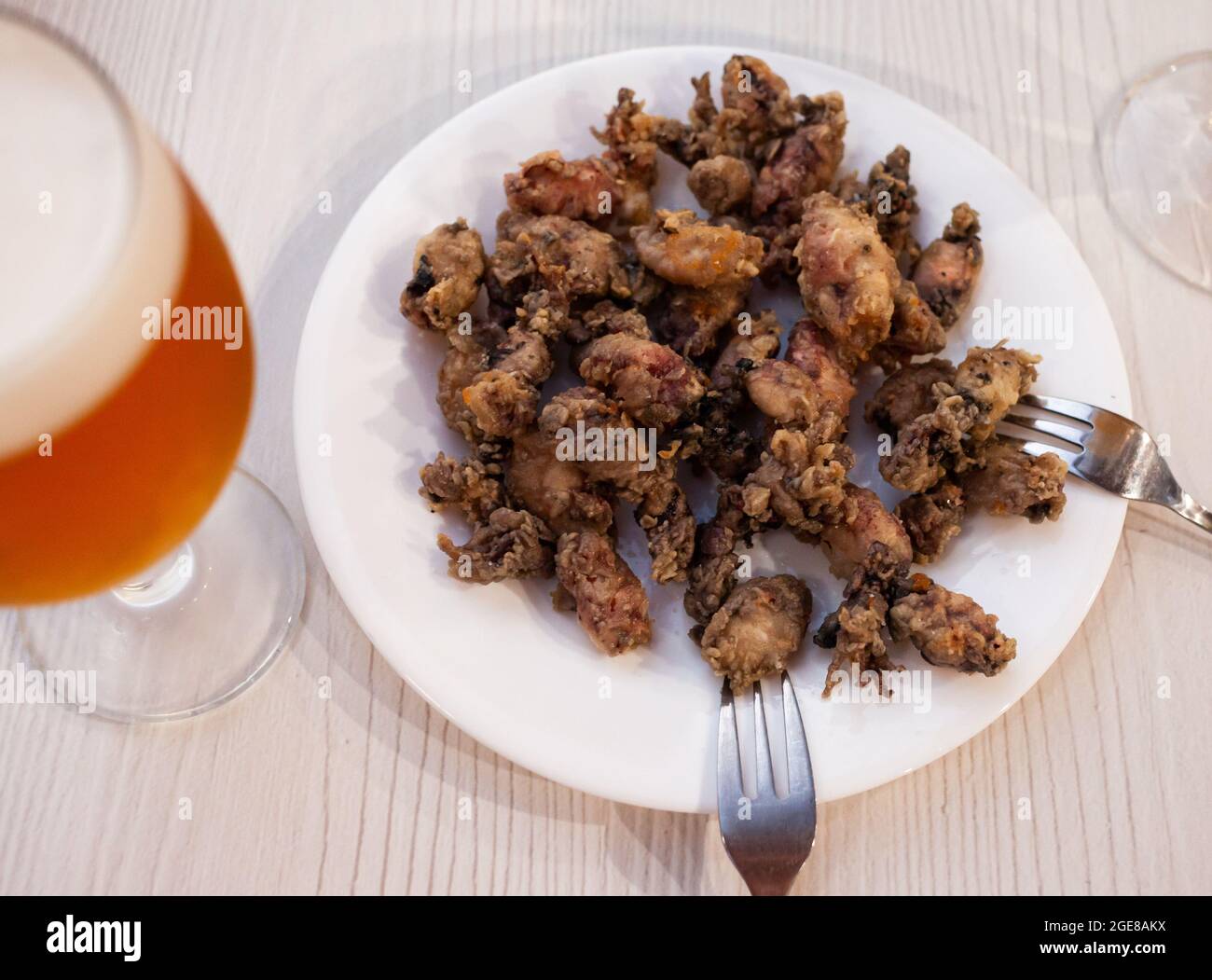 Deep fried baby squid tapas hi-res stock photography and images - Alamy