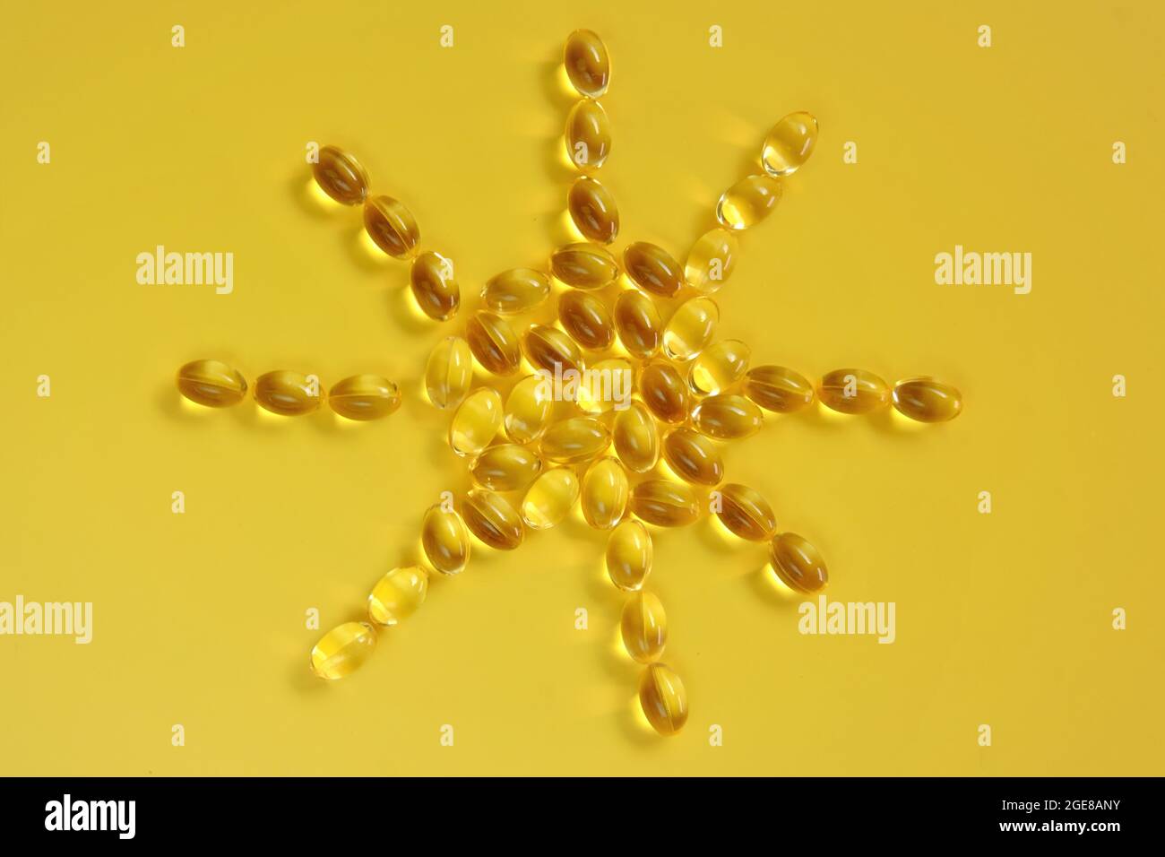 Vitamin D.Sun made from vitamin D capsules.gelatin capsules with ...