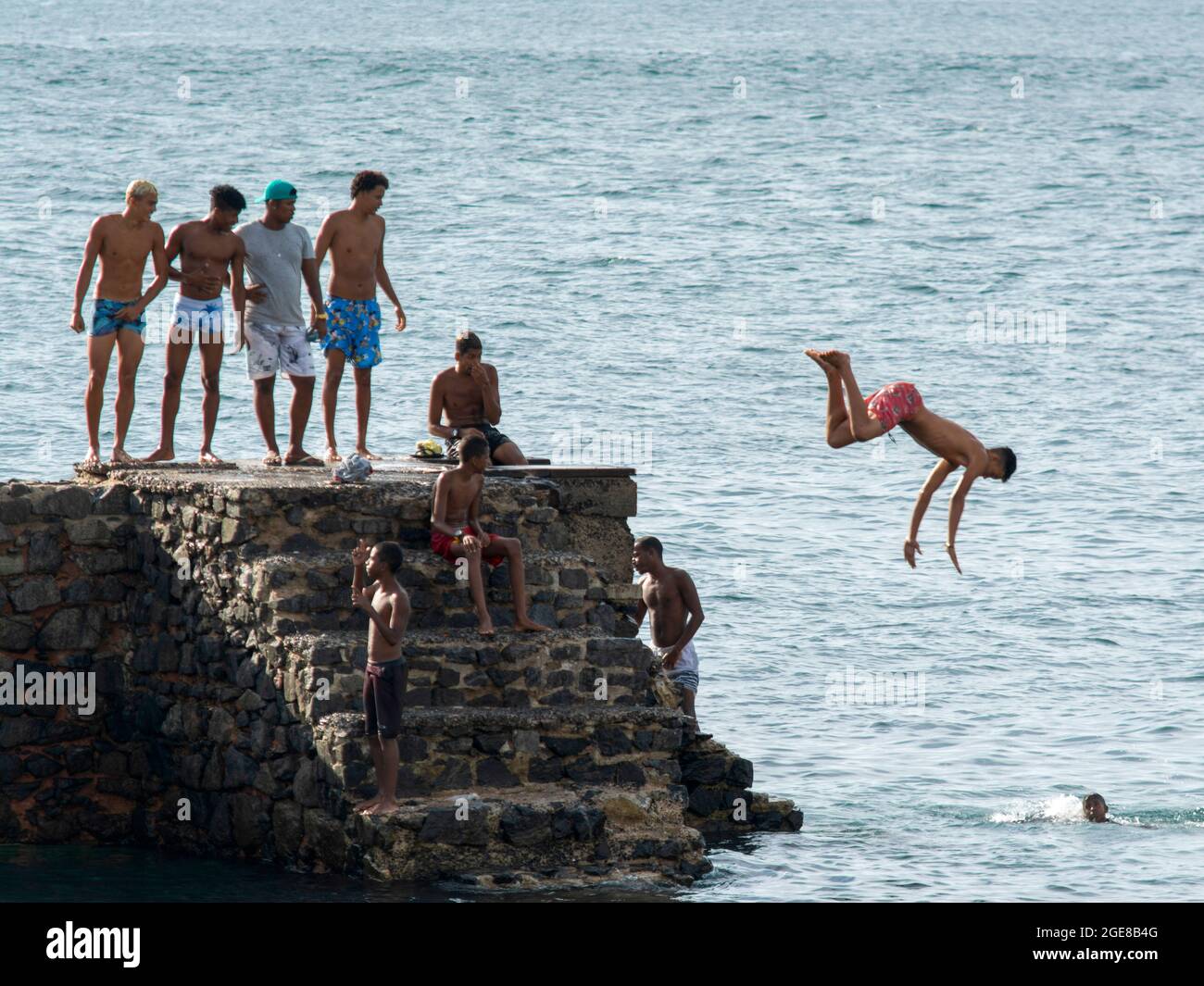 Family jumping into sea hi-res stock photography and images - Alamy