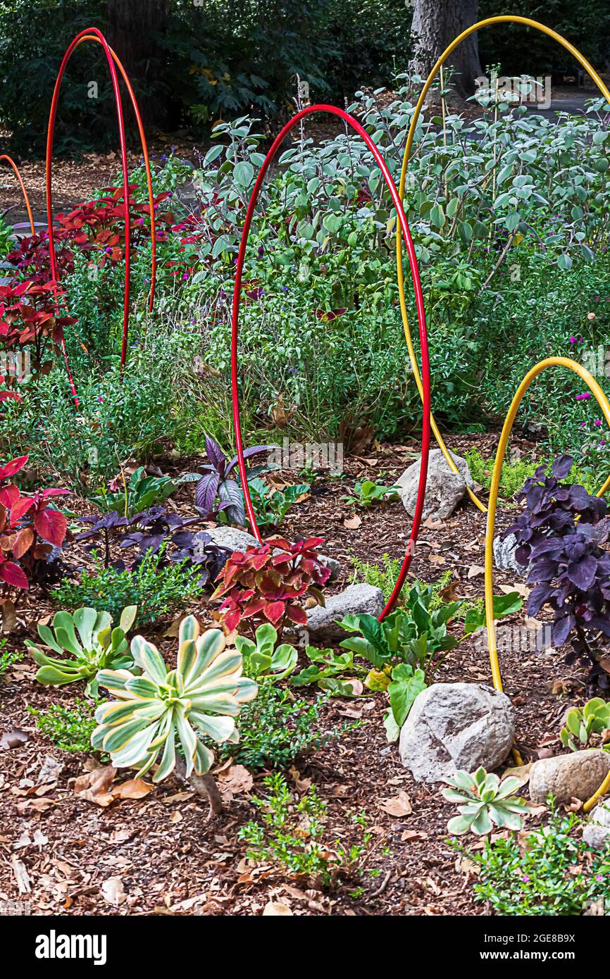 colorful decorative metal rings placed in a public garden Stock Photo ...