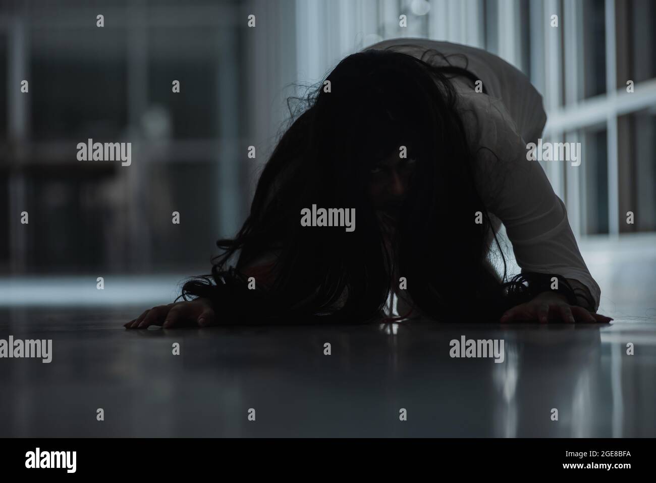 Horror evil woman ghost creepy crawling move slowly creeping out in a ...