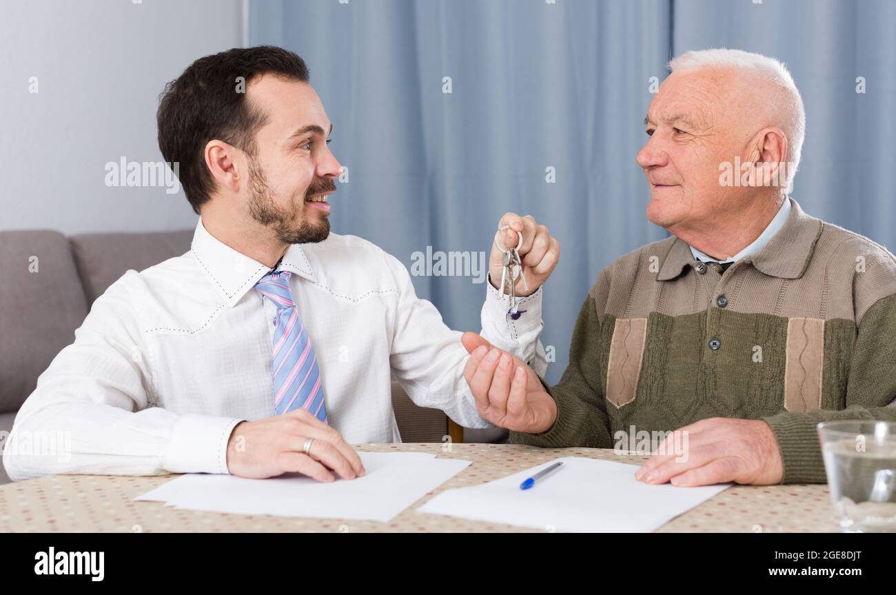 Man buying house at home Stock Photo - Alamy