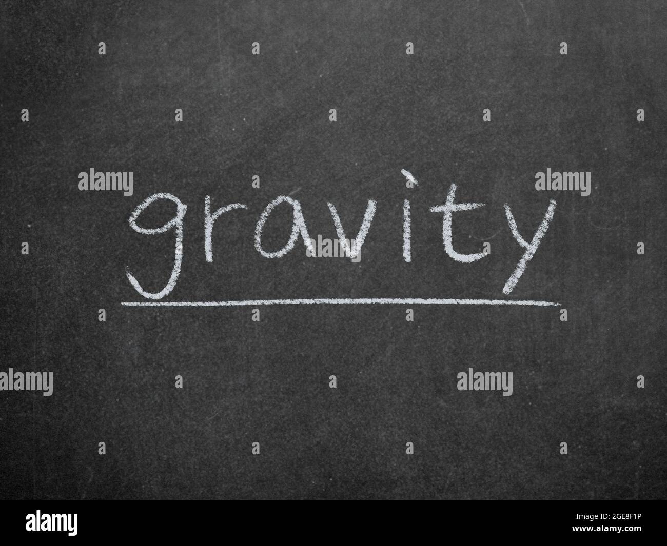 gravity concept word on blackboard background Stock Photo - Alamy