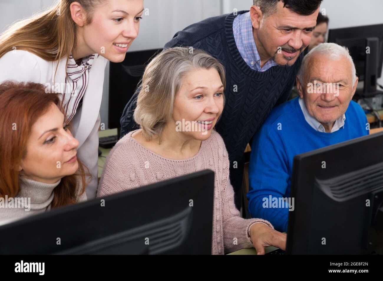 Teacher students classroom monitor hi-res stock photography and images ...