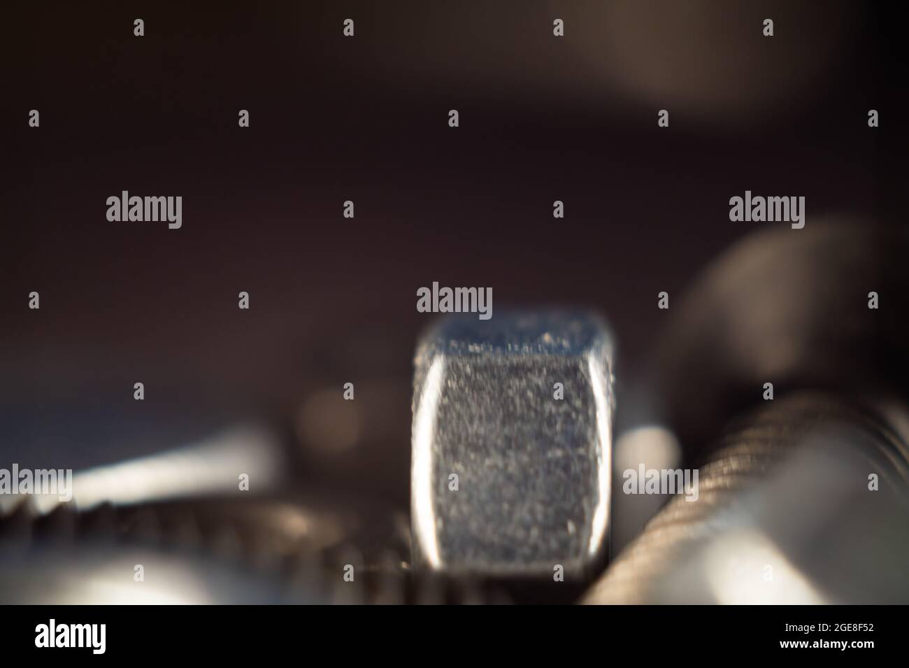 Closeup shot of a metallic cube by nails and drill screws Stock Photo ...