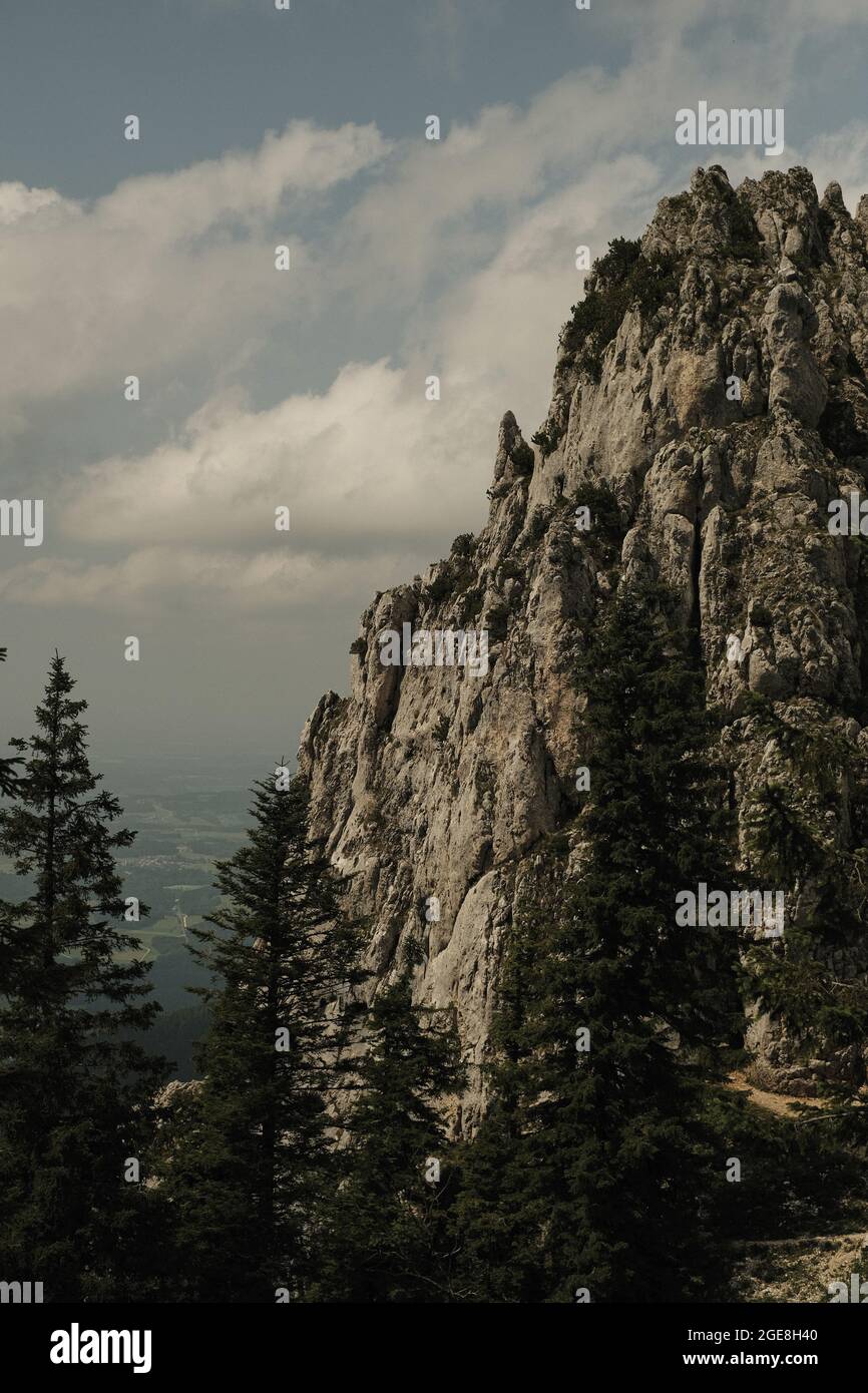 Beautiful shot of high rocks under the cloudy sky Stock Photo - Alamy