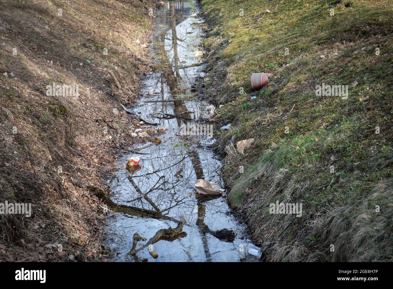 Ditch contaminated with municipal waste. Ecology and clean environment ...
