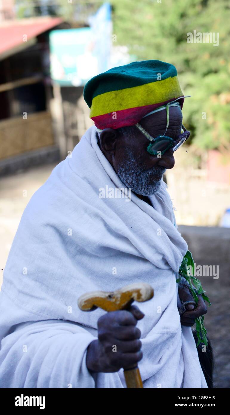 An elderly Ethiopian man wearing a rasta color hat Stock Photo - Alamy