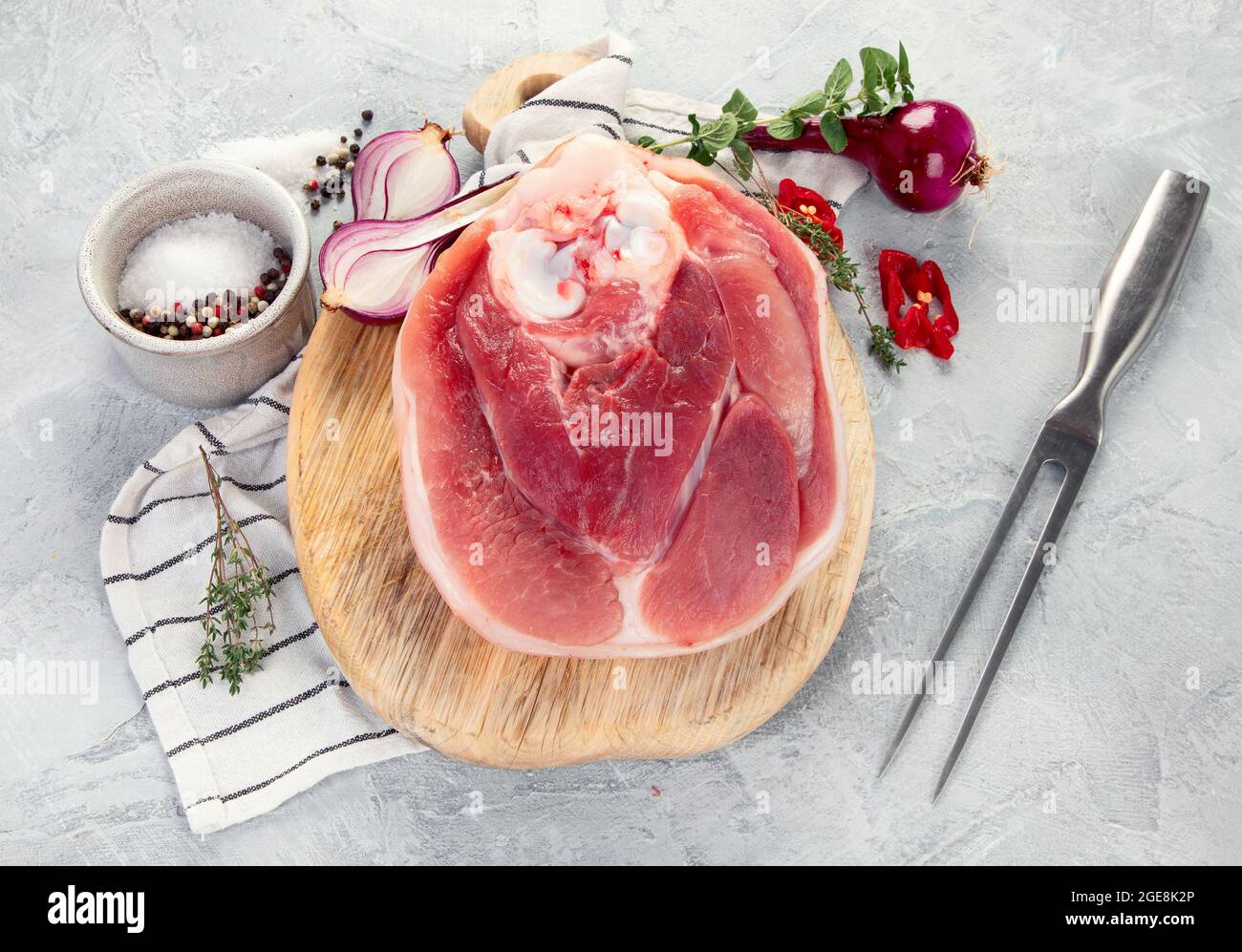 Raw ham leg on ligth gray background. Organic gourmet food concept. Top ...