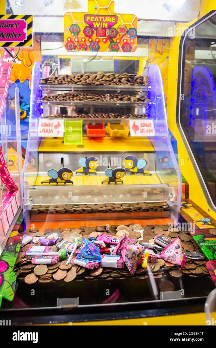 WESTWARD HO!, DEVON, ENGLAND - 21 June 2021: 2p arcade machine in ...