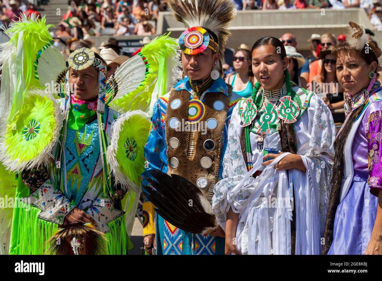 First Nations people dressed in their costumes at the centenary event ...