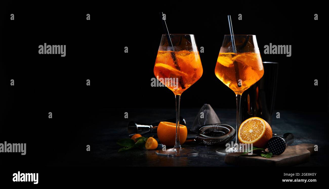 Aperol spritz cocktail served on dark background. Classic drink menu ...