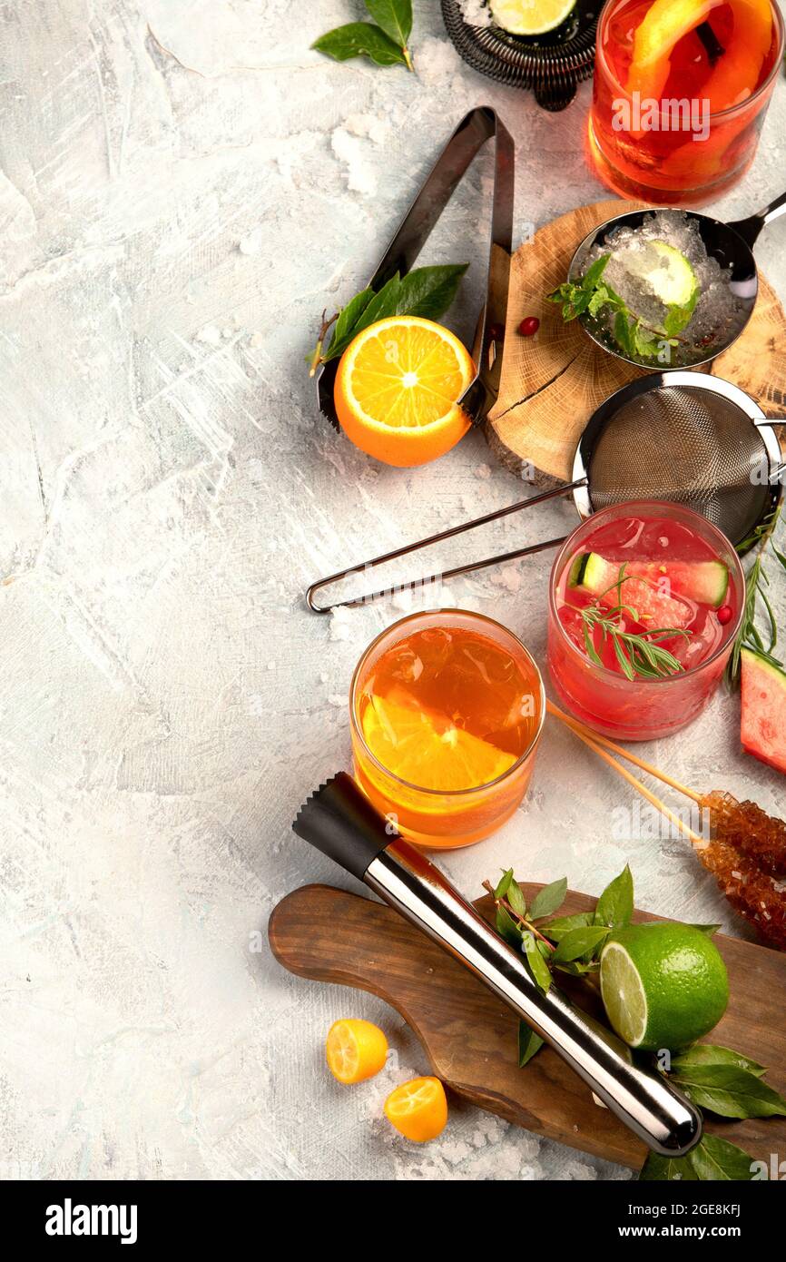 Cocktails assortment served on light background. Classic drink menu ...