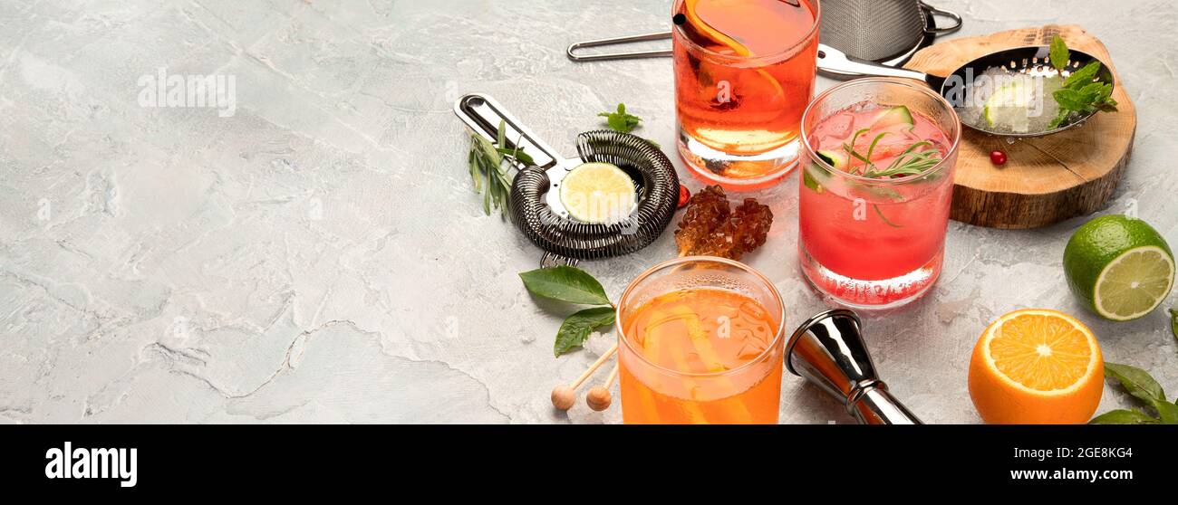 Cocktails assortment served on light background. Classic drink menu ...