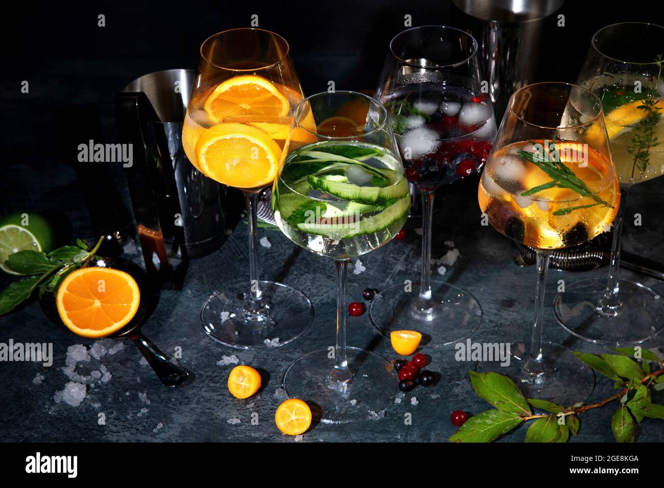 Gin cocktails assortment served on dark background. Creative drinks ...