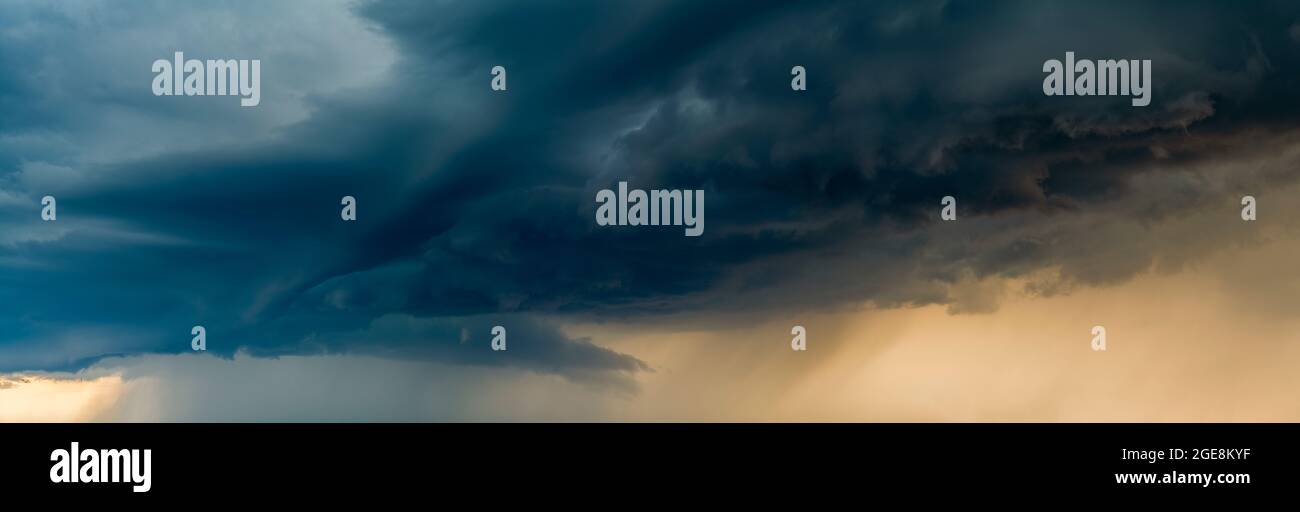 huge storm cloud that causes heavy rainfall-Panorama Stock Photo - Alamy