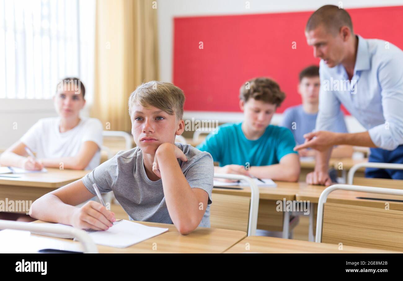 Portrait of attentive focused boy in auditorium Stock Photo - Alamy