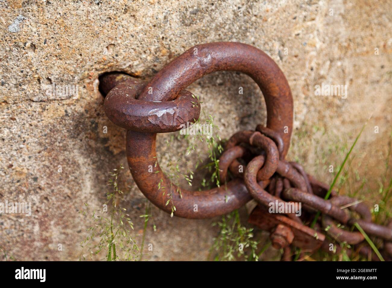 rusty metal ring that is for mooring boats Stock Photo - Alamy