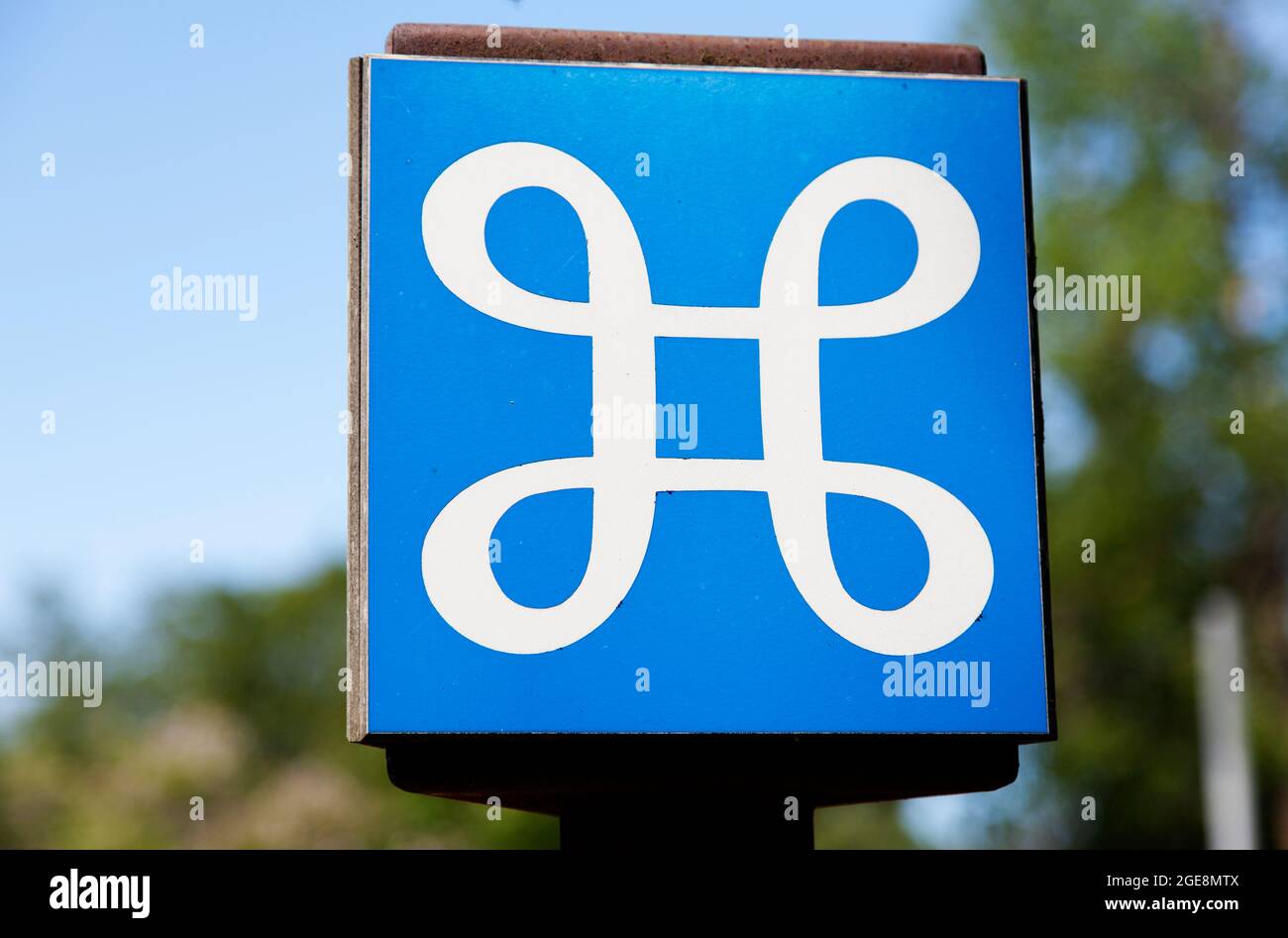 white on blue traffic sign for attraction Stock Photo - Alamy