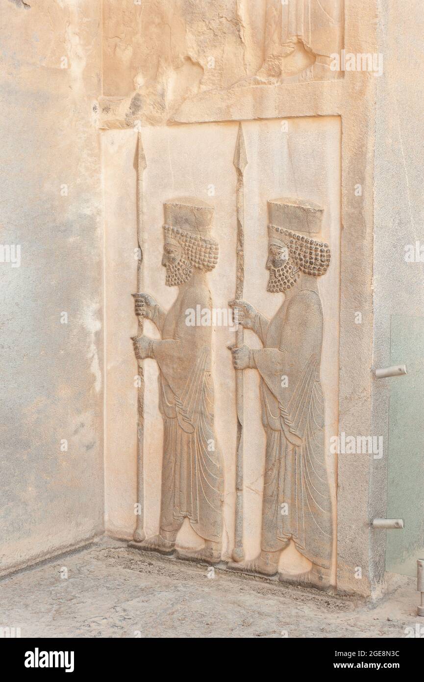 Bas relief on the wall of ruins in the Persepolis in Shiraz, Iran. The ...