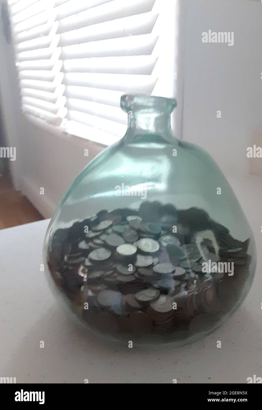 change jar up close Stock Photo - Alamy