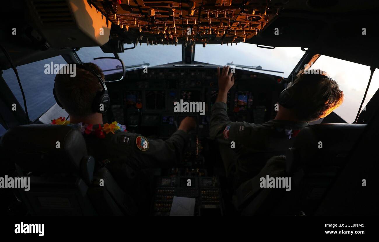 PACIFIC OCEAN (Aug. 15, 2021) Lieutenants Nick Seeberger (left) and ...