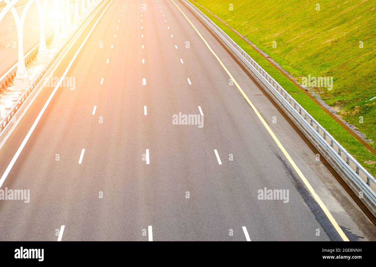 Empty multi-lane road asphalt let the markings Stock Photo - Alamy