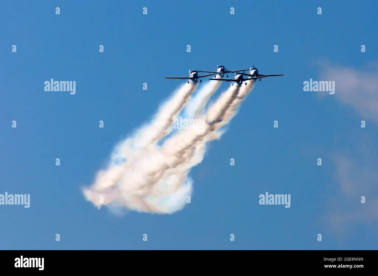 Aerobatic team aircraft fighters trail of smoke in the sky Stock Photo ...
