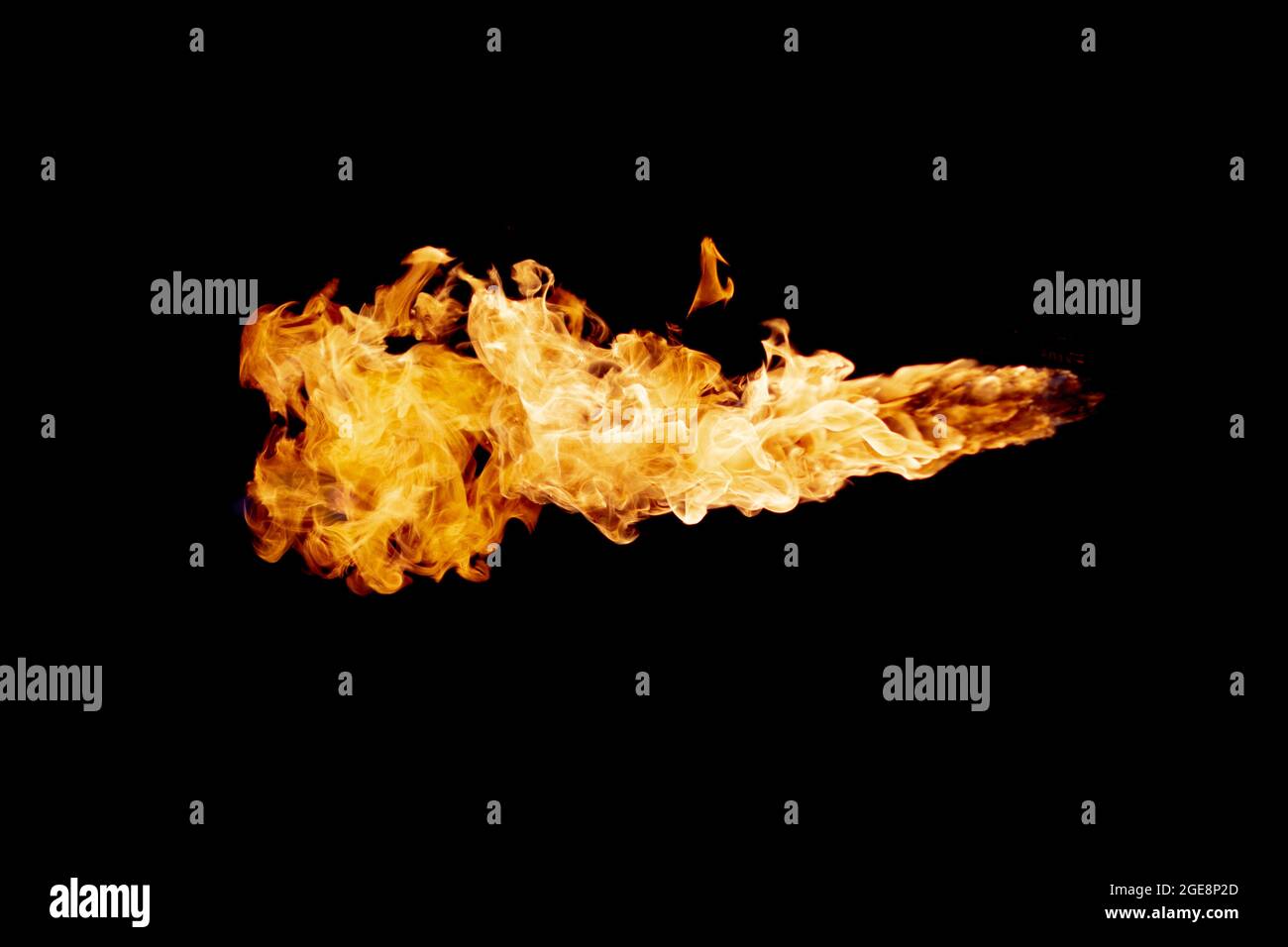 Fire flame jet stream on dark black background Stock Photo - Alamy