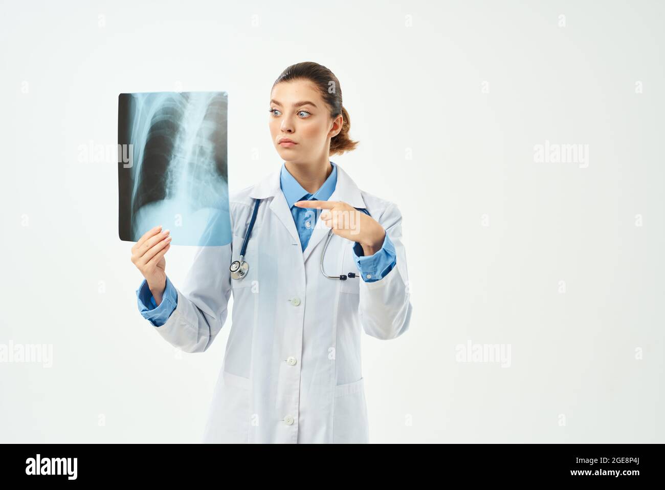 female doctor dressing gown x-ray emotion hospital Stock Photo - Alamy