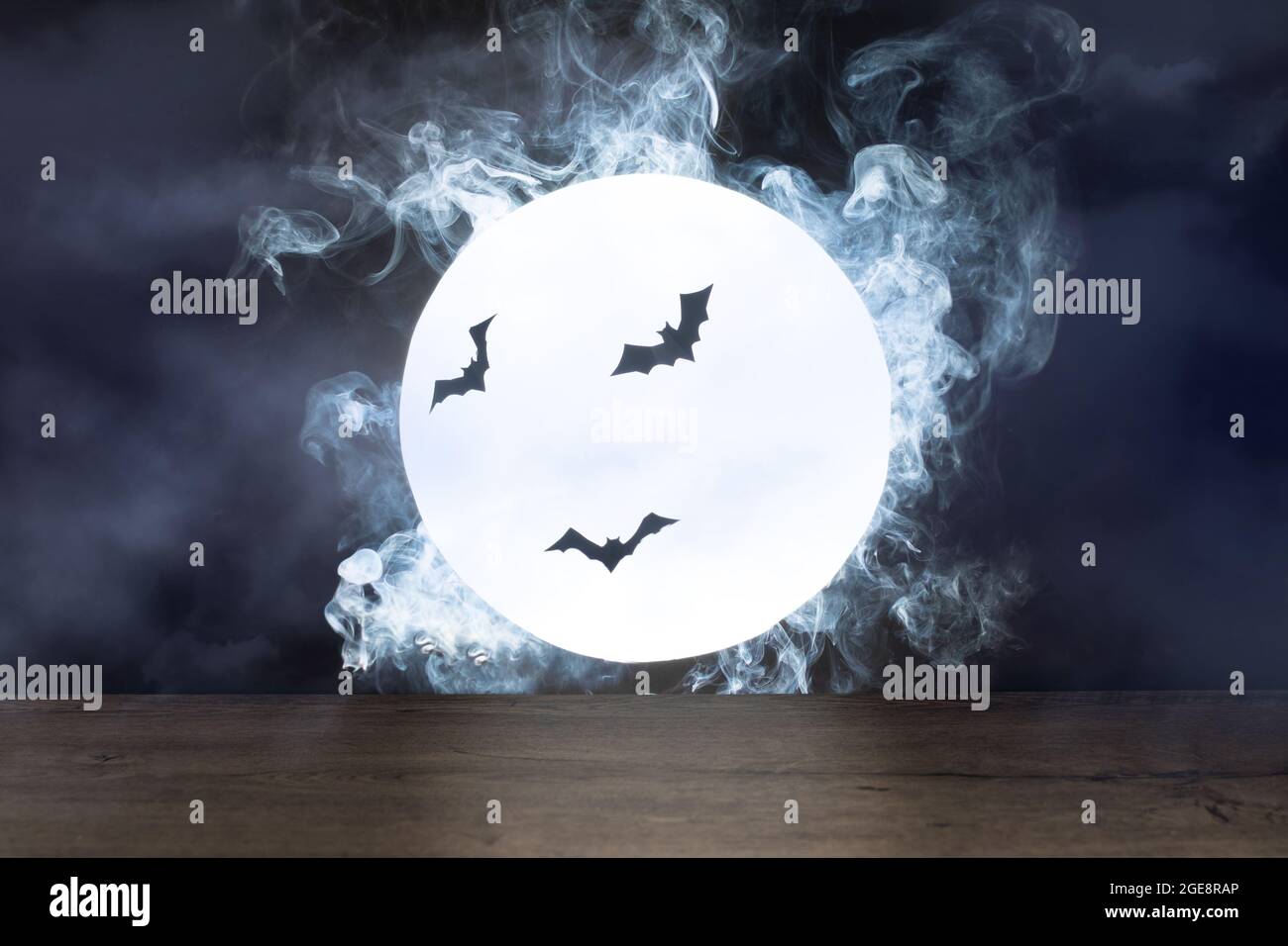 Halloween background. Spooky night with full moon and wooden table ...