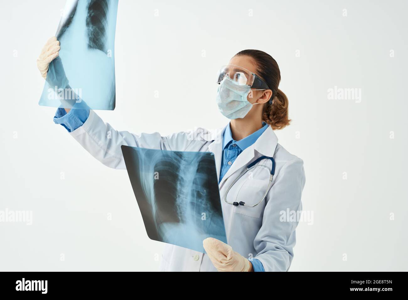 radiologist with x-ray health care light background Stock Photo - Alamy