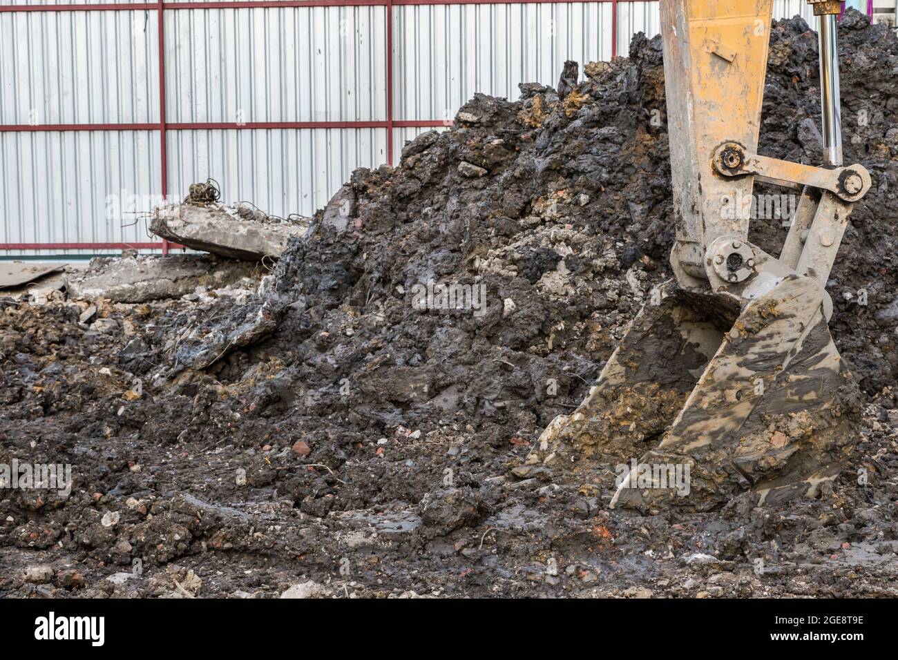 excavator scoop digging on the ground background Stock Photo - Alamy